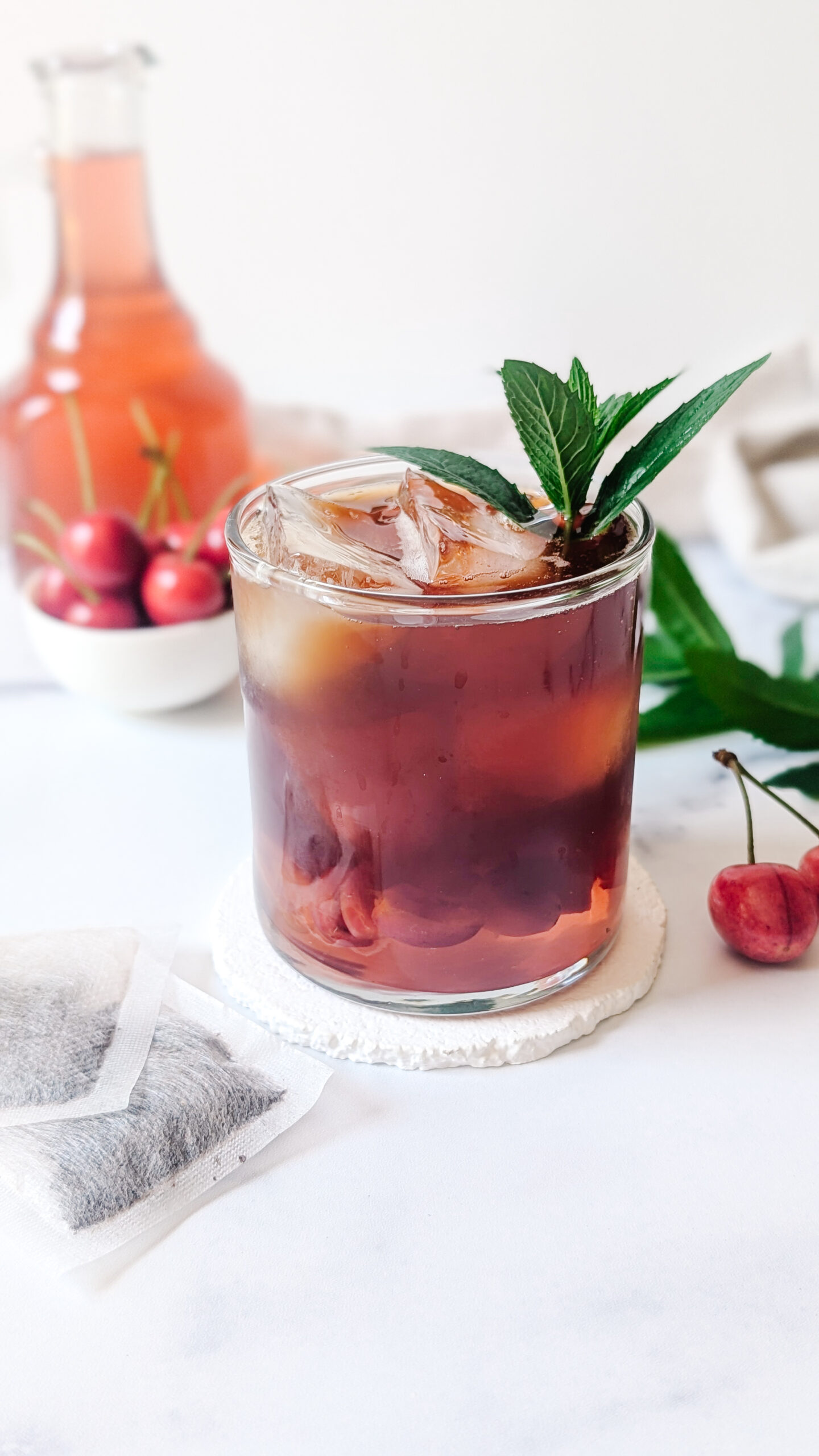 Cup Cherry Ice Tea Elevated Springtime Menus : Iced Cherry Chai